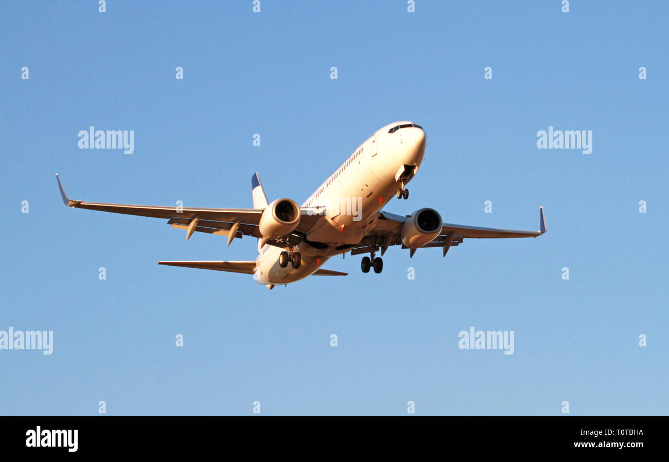 landing approach of a passenger jet Stock Photo - Alamy