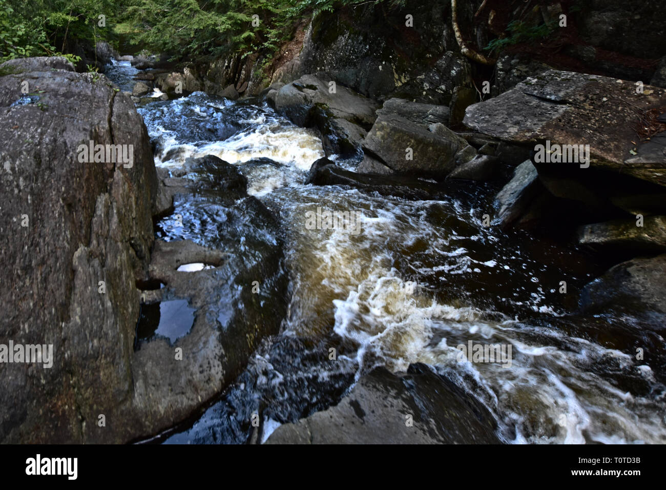 waterfall flowing through rocks Stock Photo - Alamy waterfall flowing through rocks Stock Photo - Alamy