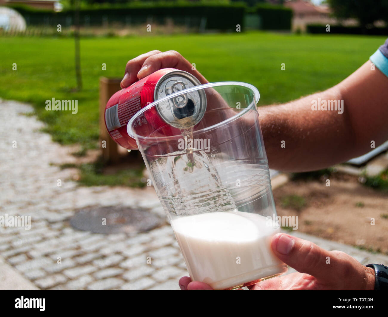 Man drinking beer in park hi-res stock photography and images - Alamy