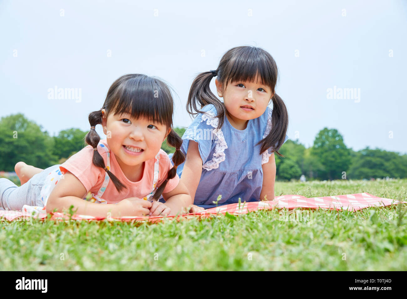 Japanese kids at a city park Stock Photo - Alamy