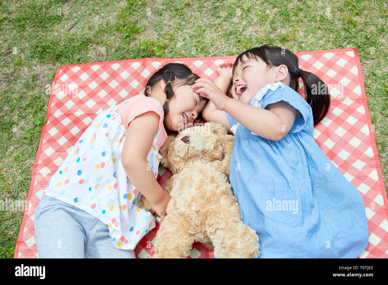 Japanese kids at a city park Stock Photo - Alamy