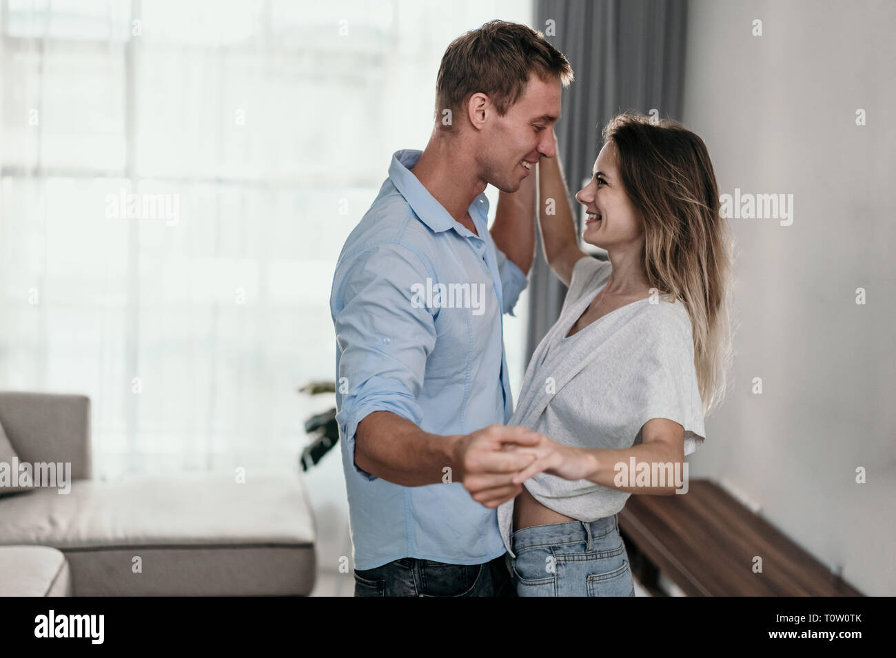 Intimate couple dancing at home Stock Photo - Alamy