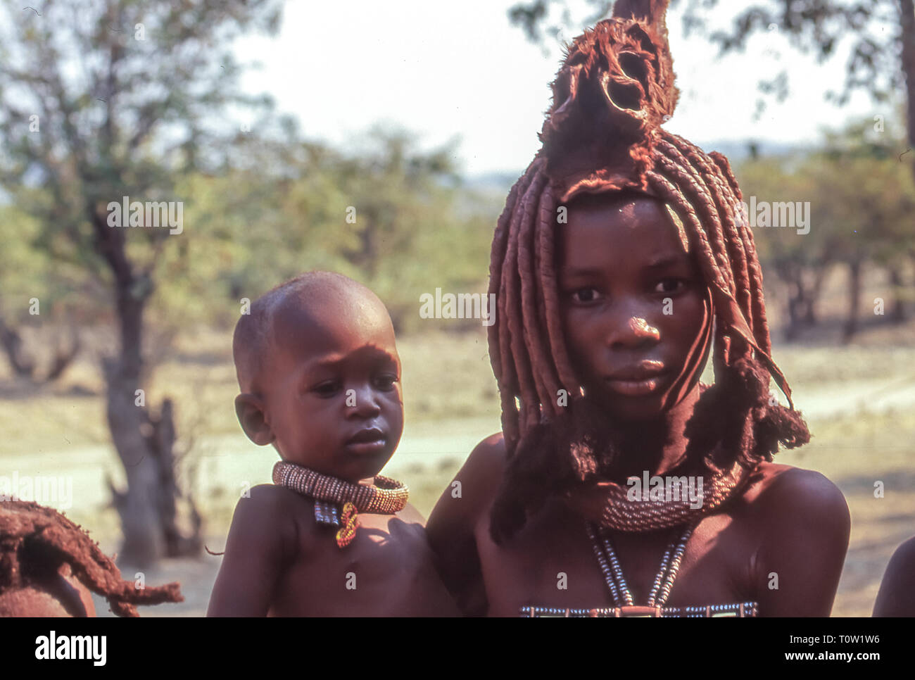 Young Himba mother with her baby in her arms Stock Photo - Alamy