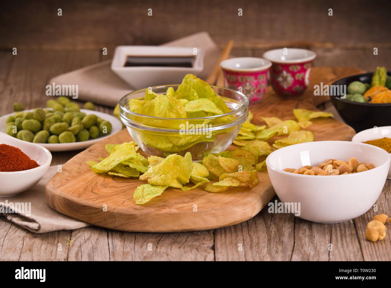 Wasabi flavour potato crisps Stock Photo - Alamy