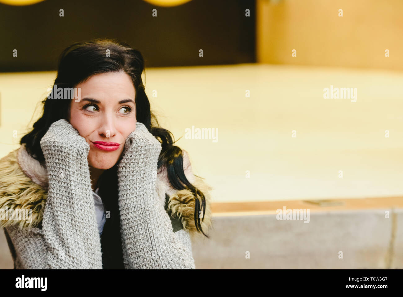 Worried woman with expression on her face Stock Photo - Alamy