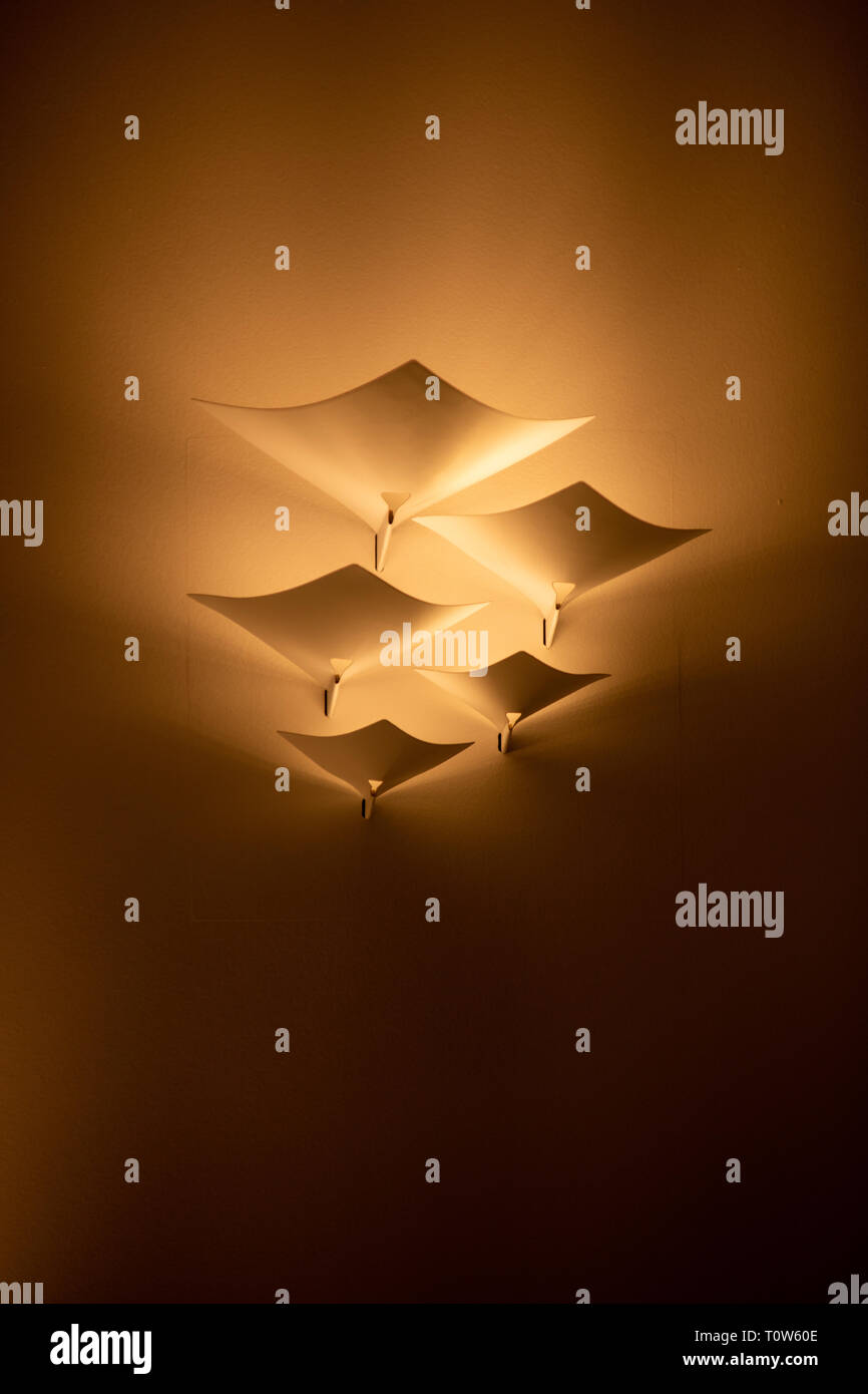 Creative paper light setup on wall Stock Photo - Alamy