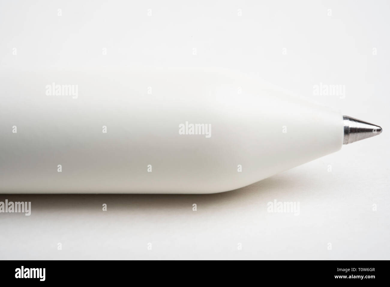 An extreme close-up or a macro shot of the writing tip of a modern ...