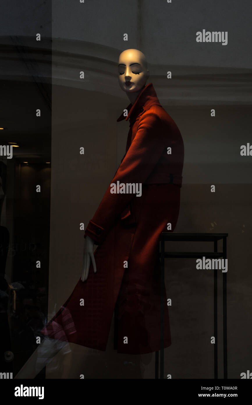 Lady wearing a red coat hi-res stock photography and images - Alamy