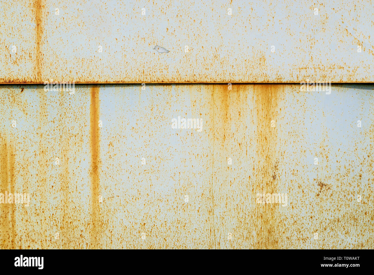 Texture of old metal close-up with rust marks and cracks of corrosion ...