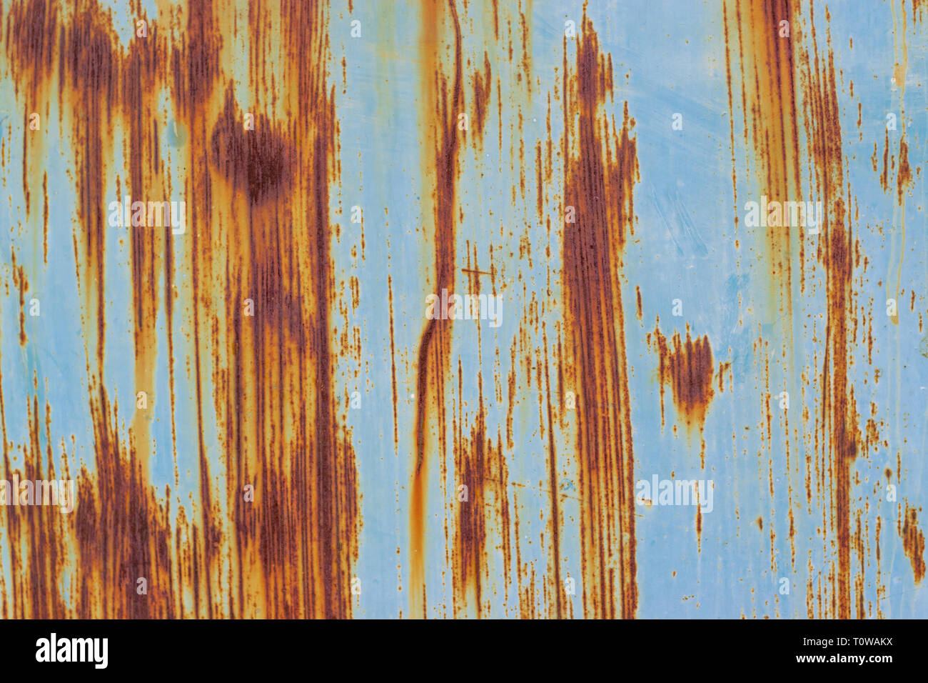 Texture of old metal close-up with rust marks and cracks of corrosion ...