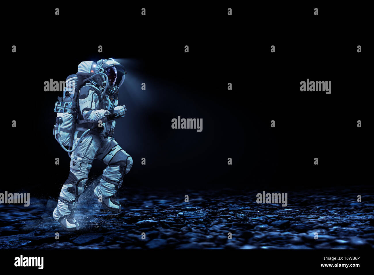 Spaceman running fast. Mixed media Stock Photo - Alamy