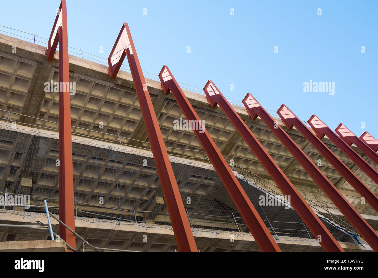 Unfinished high rise building with external girders Stock Photo - Alamy