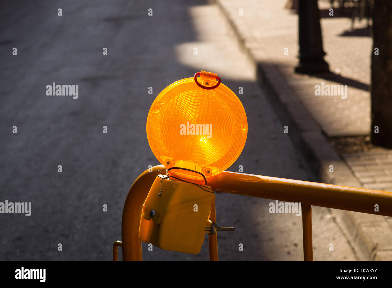 Orange warning light as used on road works Stock Photo - Alamy