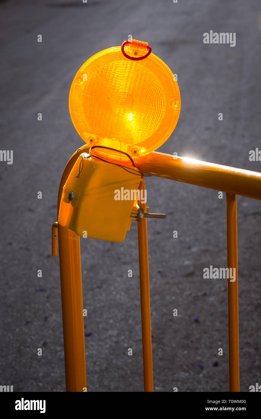 Orange warning light as used on road works Stock Photo - Alamy