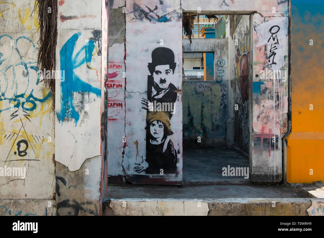 A Charlie Chaplin graffiti stencil on a wall in Kota Kinabalu, Sabah ...