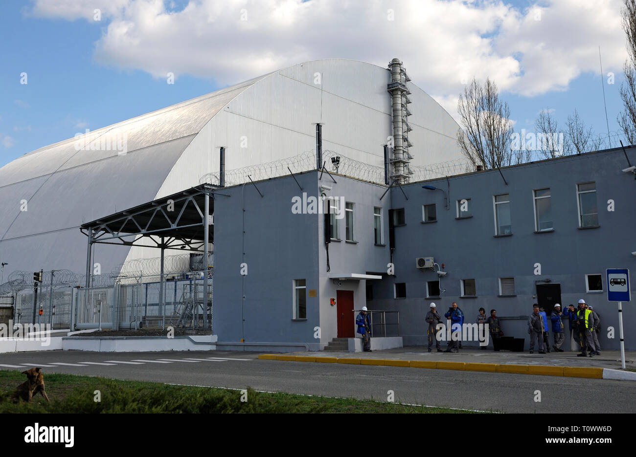 Workers of the Chernobyl Nuclear Power Plant waiting for a bus on a bus ...