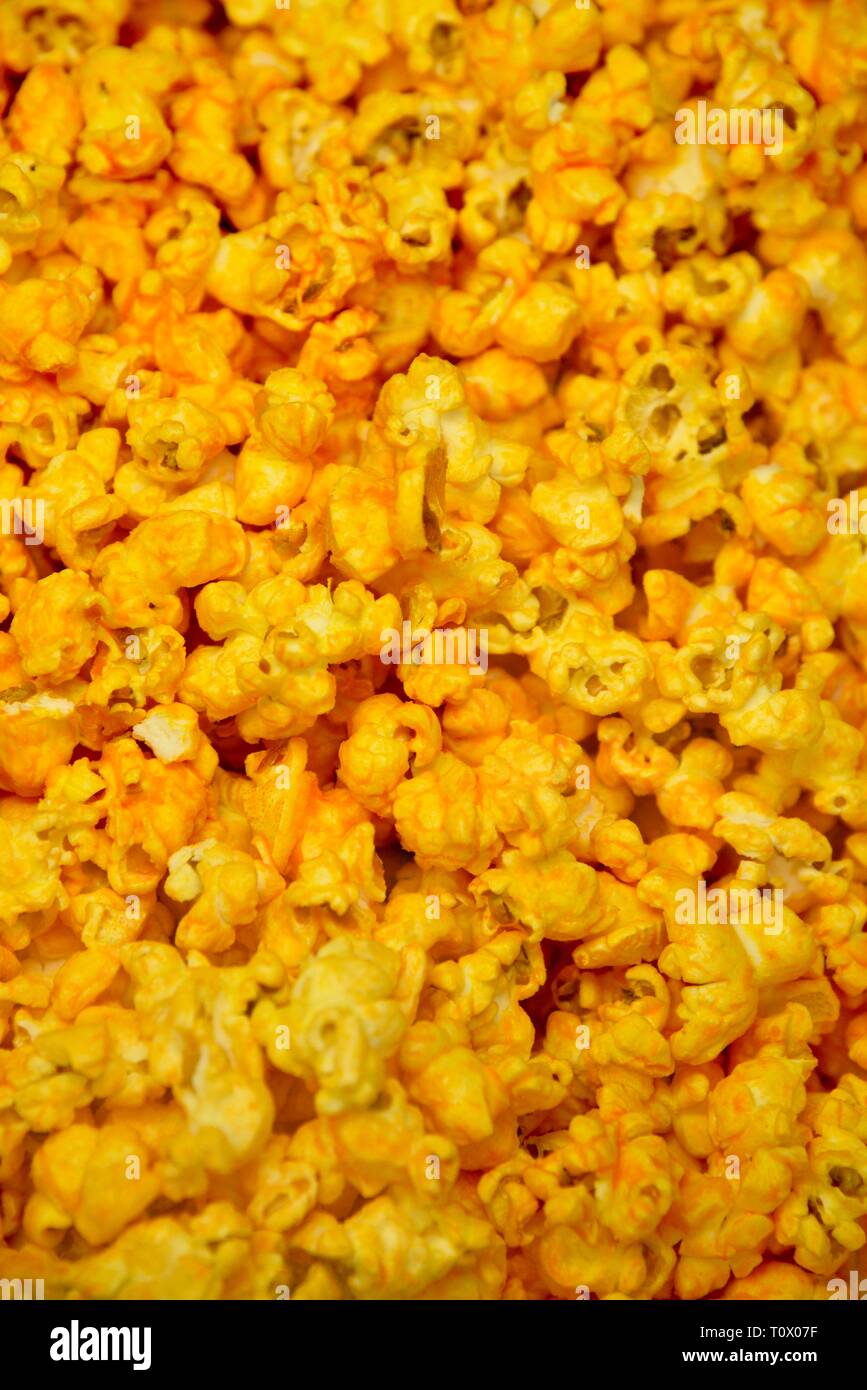 Close up pile of lots of crunchy, crisp delicious cheddar cheddar ...