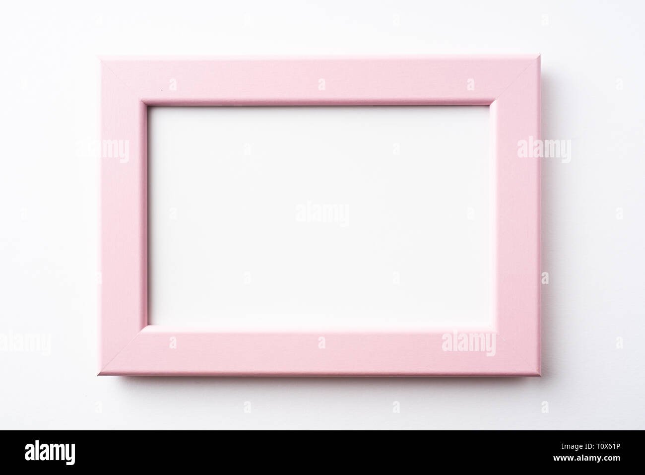 Design concept - pink wood frame for mockup Stock Photo - Alamy