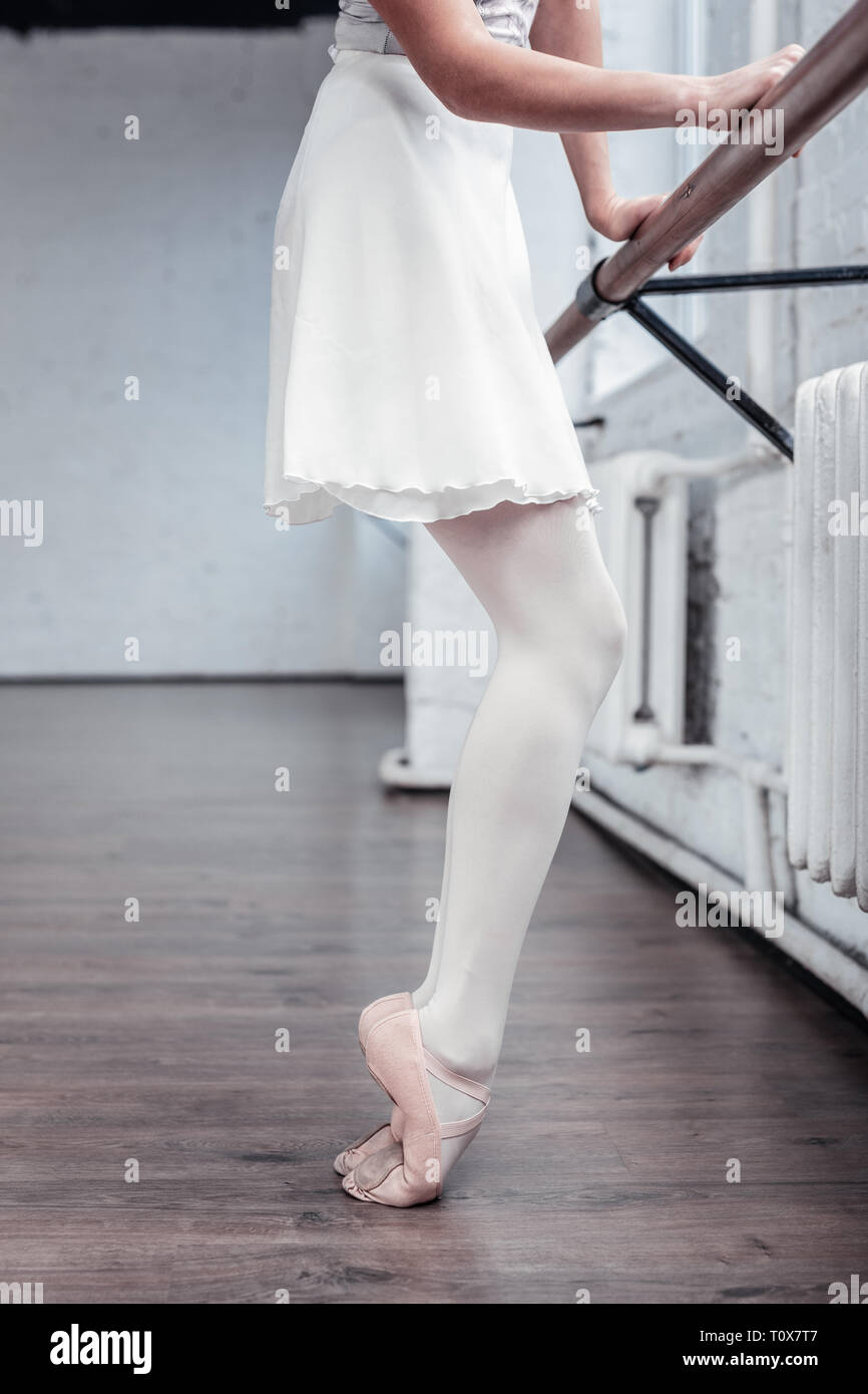Close up of bent ballet dancers legs Stock Photo - Alamy