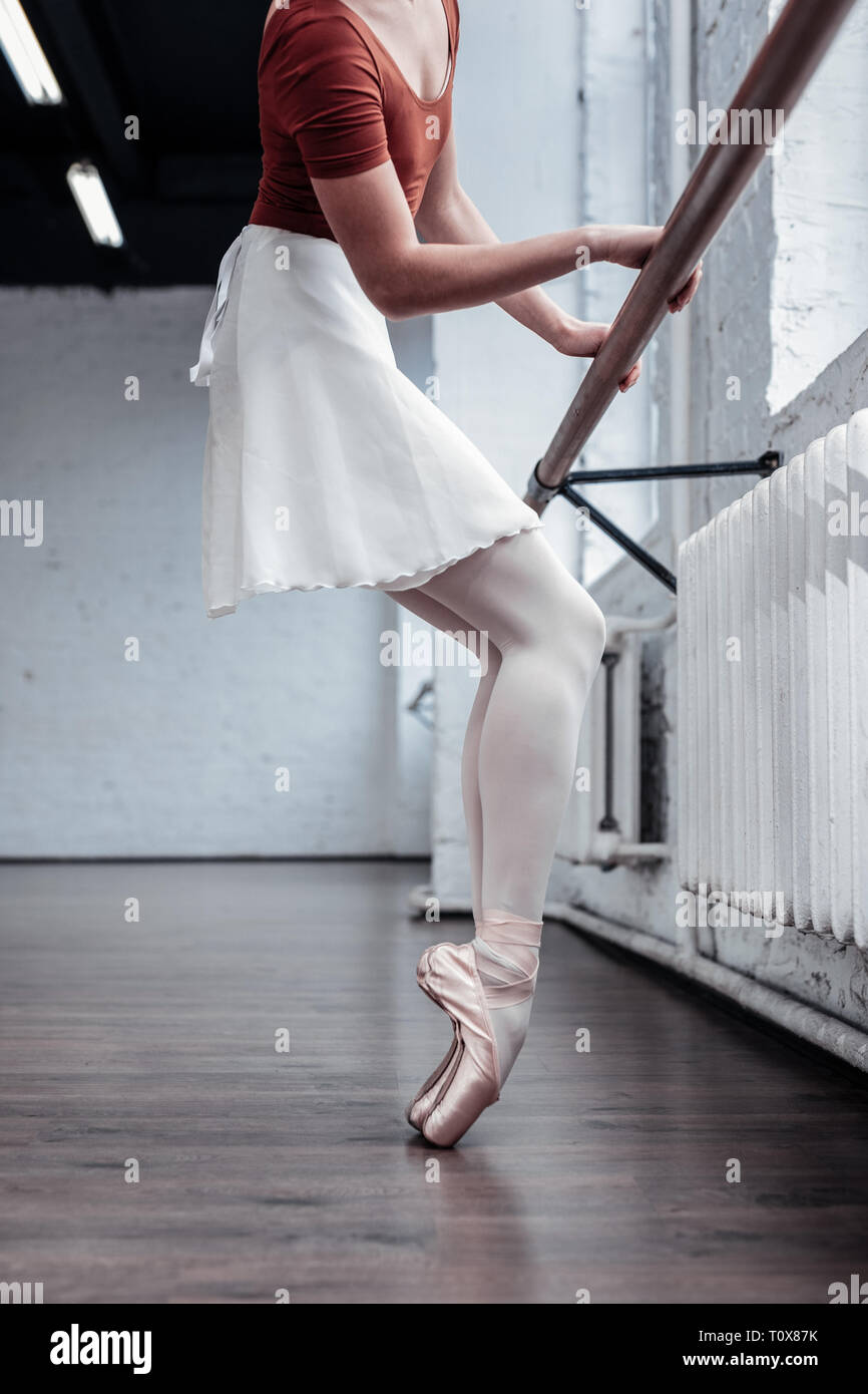 Professional skilled ballerina working on her skills Stock Photo - Alamy