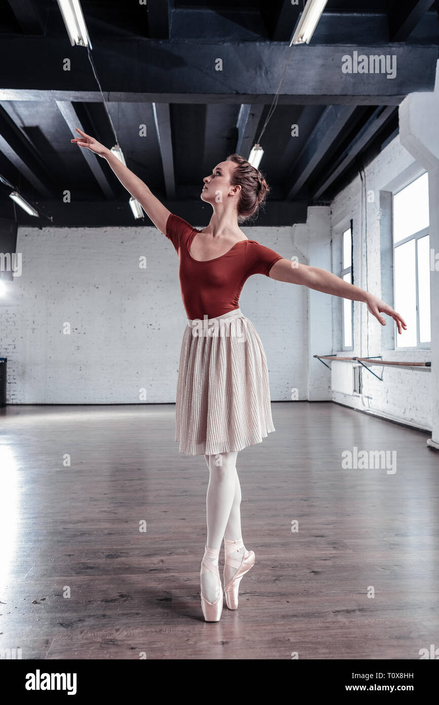 Beautiful graceful young dancer keeping her balance Stock Photo - Alamy