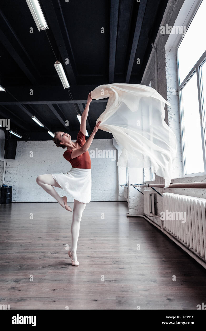 Nice pleasant woman showing a beautiful dance to you Stock Photo - Alamy