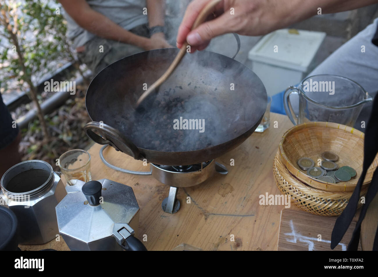 Person roasting coffee beans in hi-res stock photography and images - Alamy