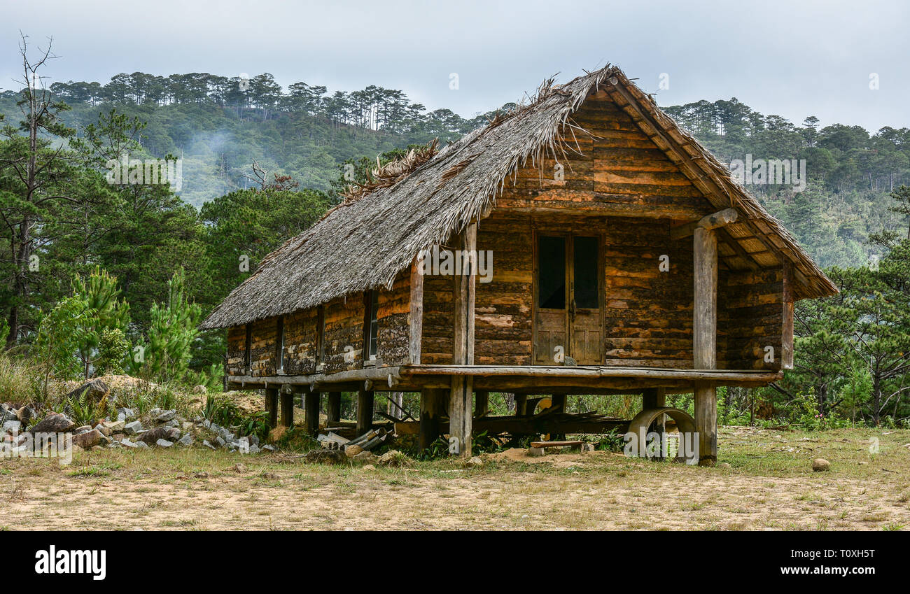 Traditional house at an ethnic village in Central Highlands of Vietnam ...
