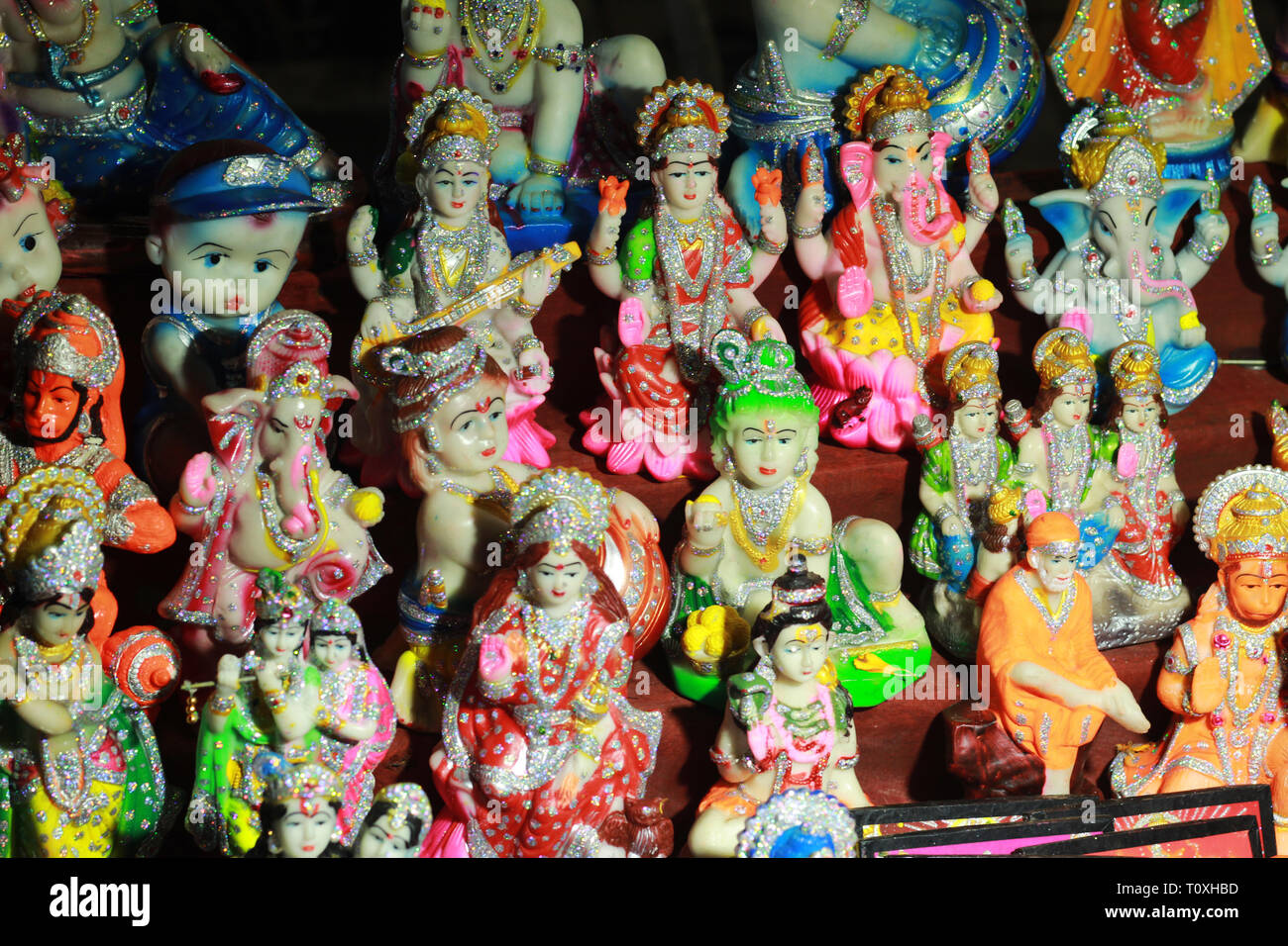 small decorated god statue Stock Photo - Alamy