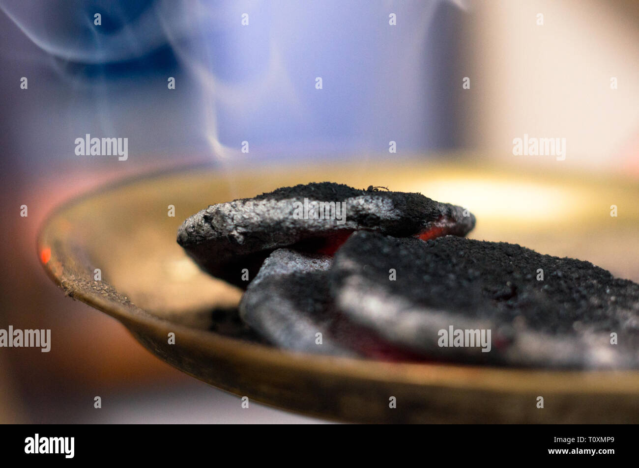 burning dung cake coal embers taken from the holika dahan fire hindu ...