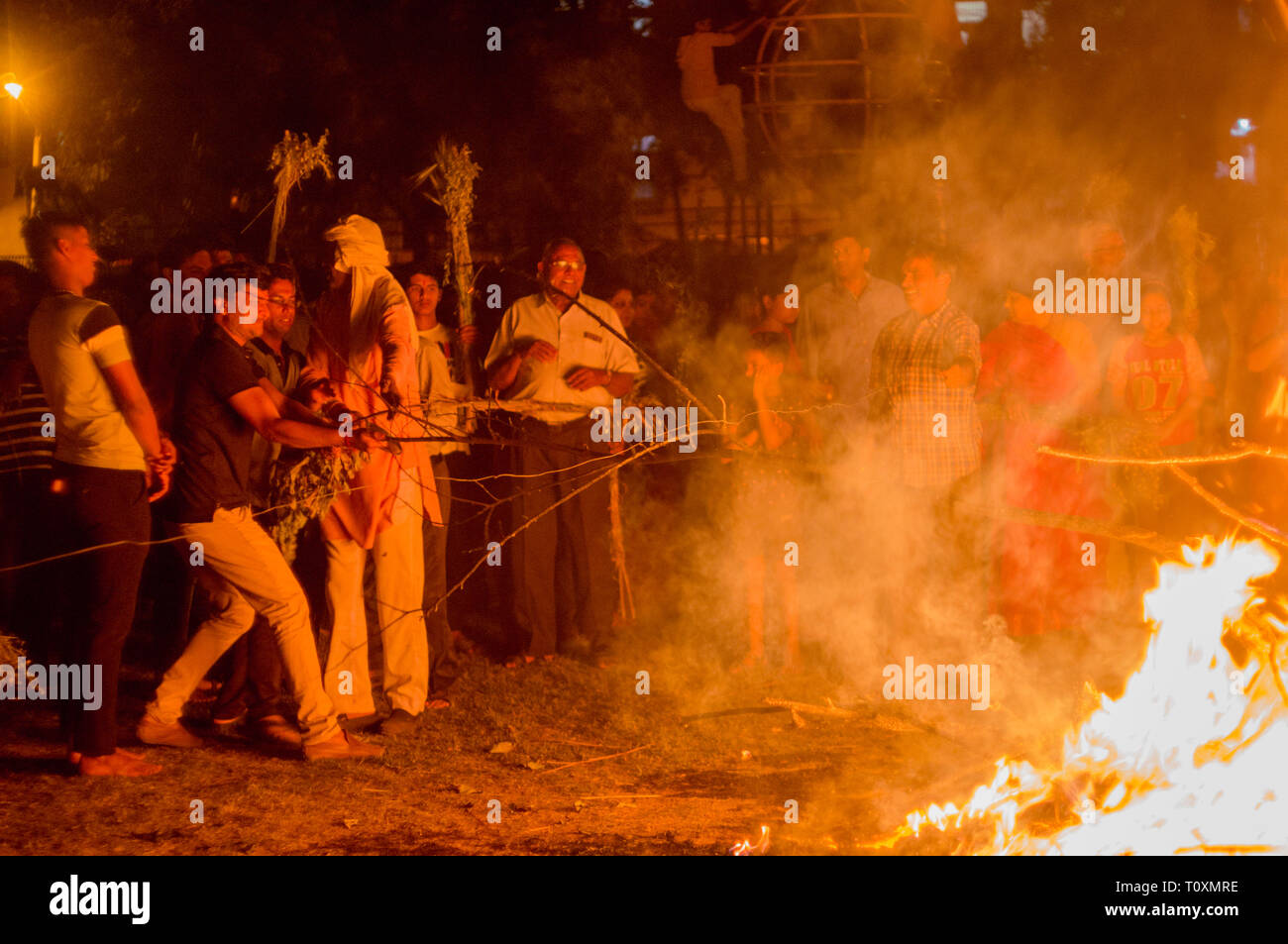 People pulling out a stick denoting the mythical figure of Prahlad from ...