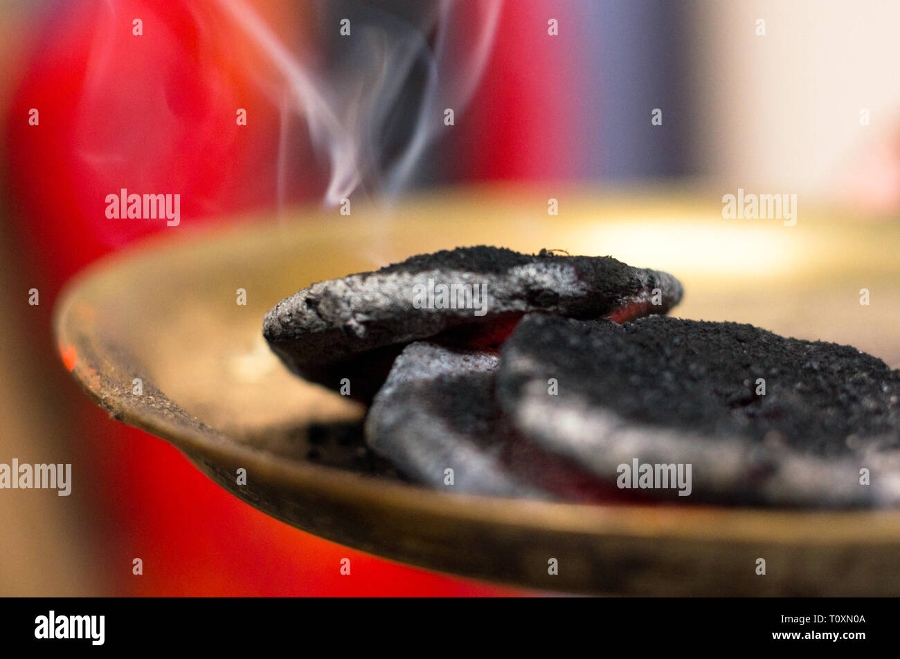 burning dung cake coal embers taken from the holika dahan fire hindu ...