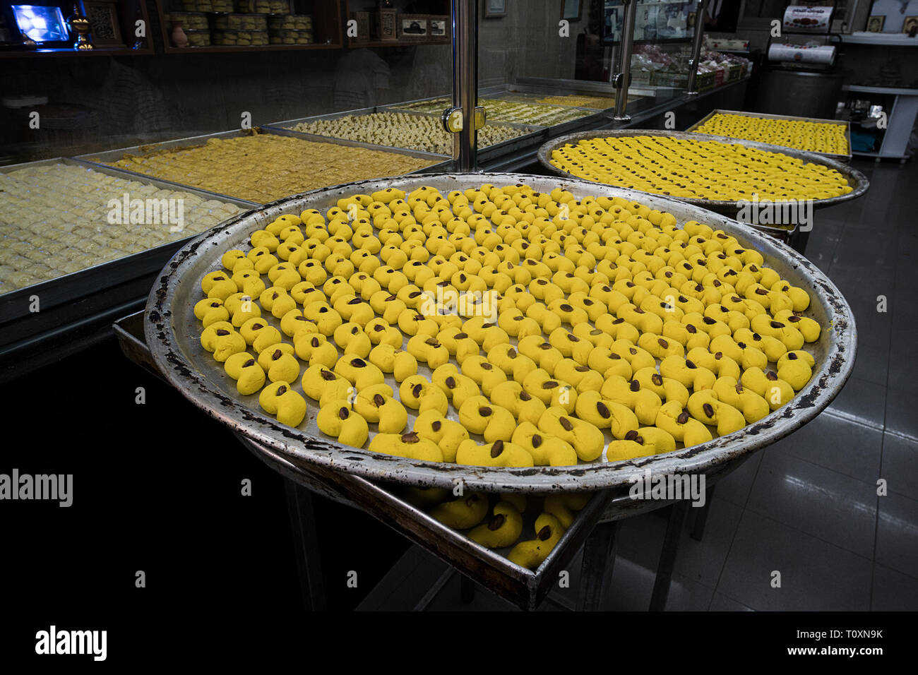 Baklava set onto the round tray at Israeli bakery. Eastern delights ...