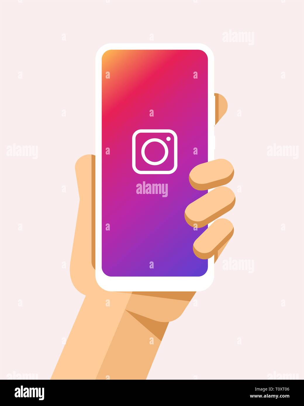 Hand holds the smartphone with Instagram application on the screen ...