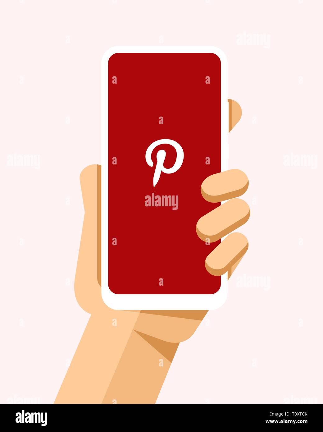 Hand holds the smartphone with Pinterest application on the screen ...