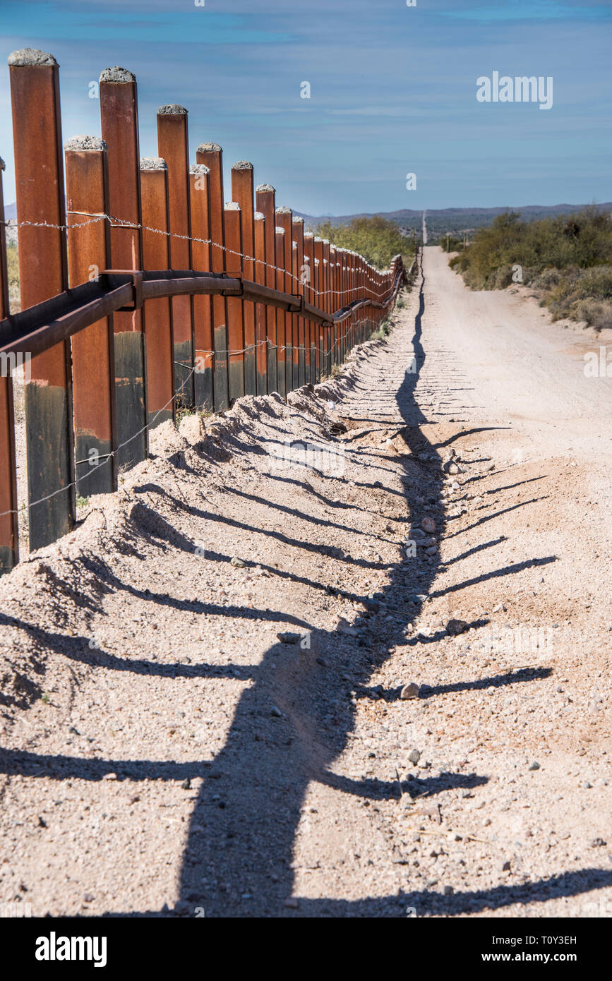 Vehicular restriction wall or fence along the international border ...