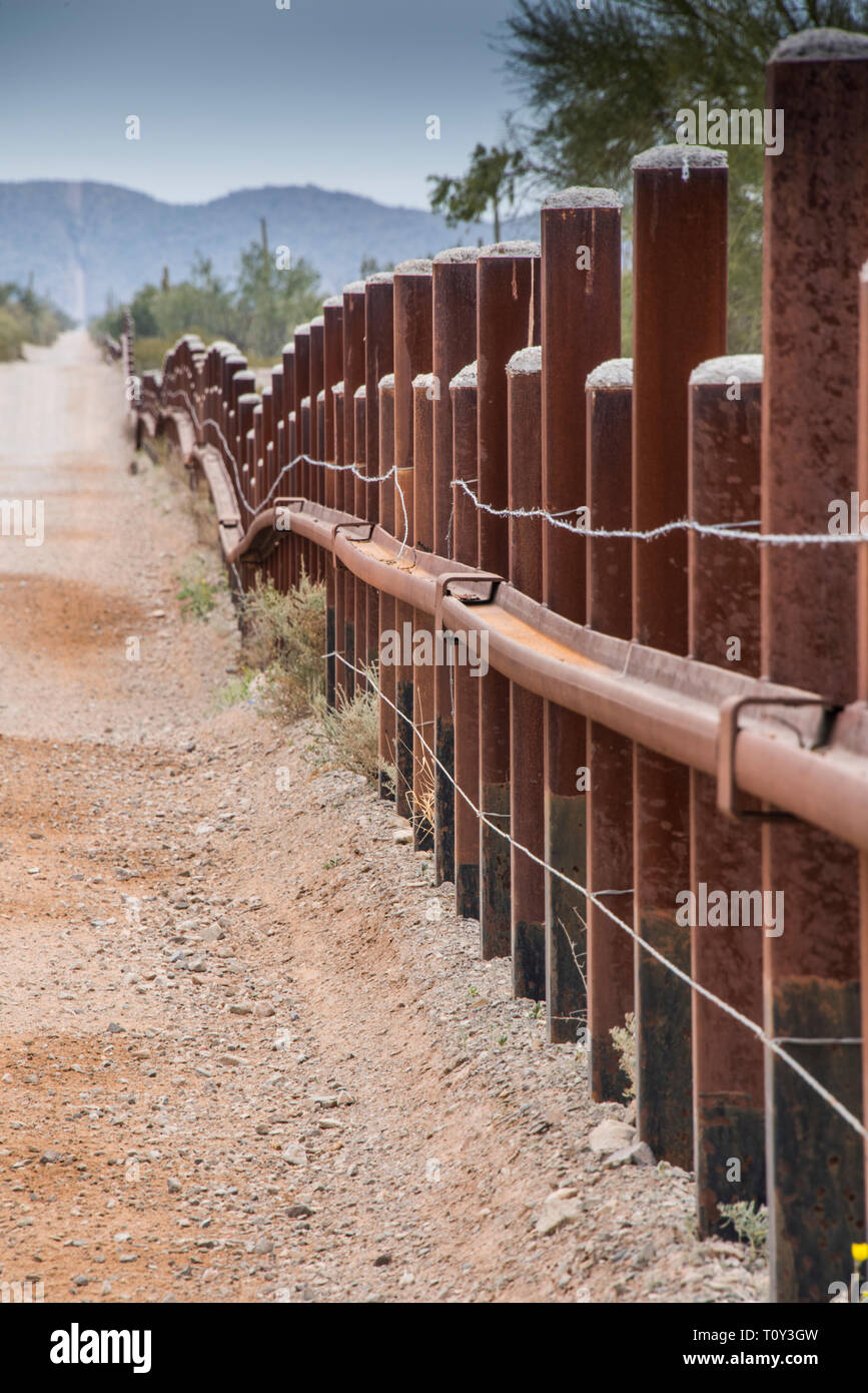 Vehicular restriction wall or fence along the international border ...