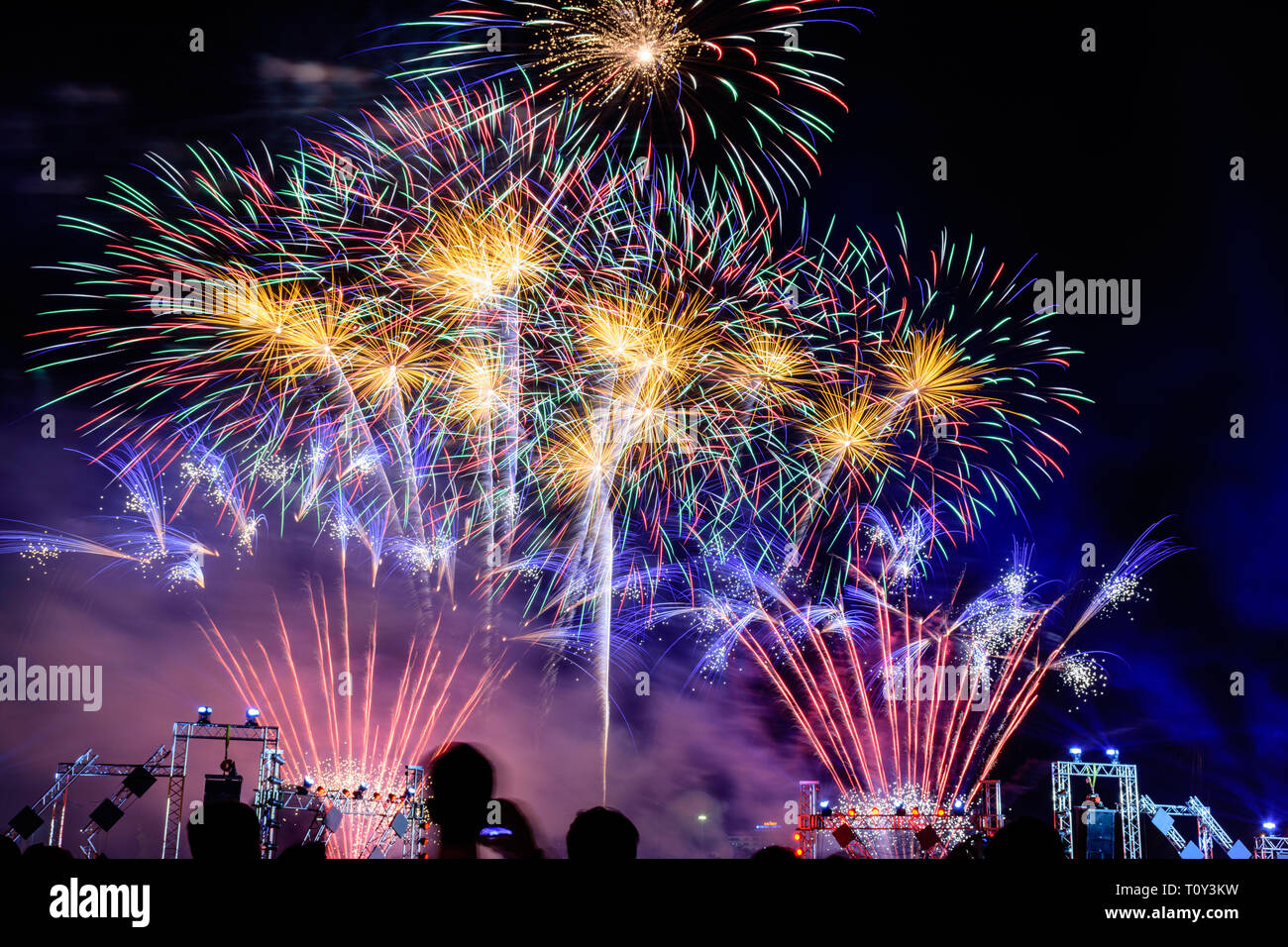 Crowd watching fireworks and celebrating city founded. Beautiful ...
