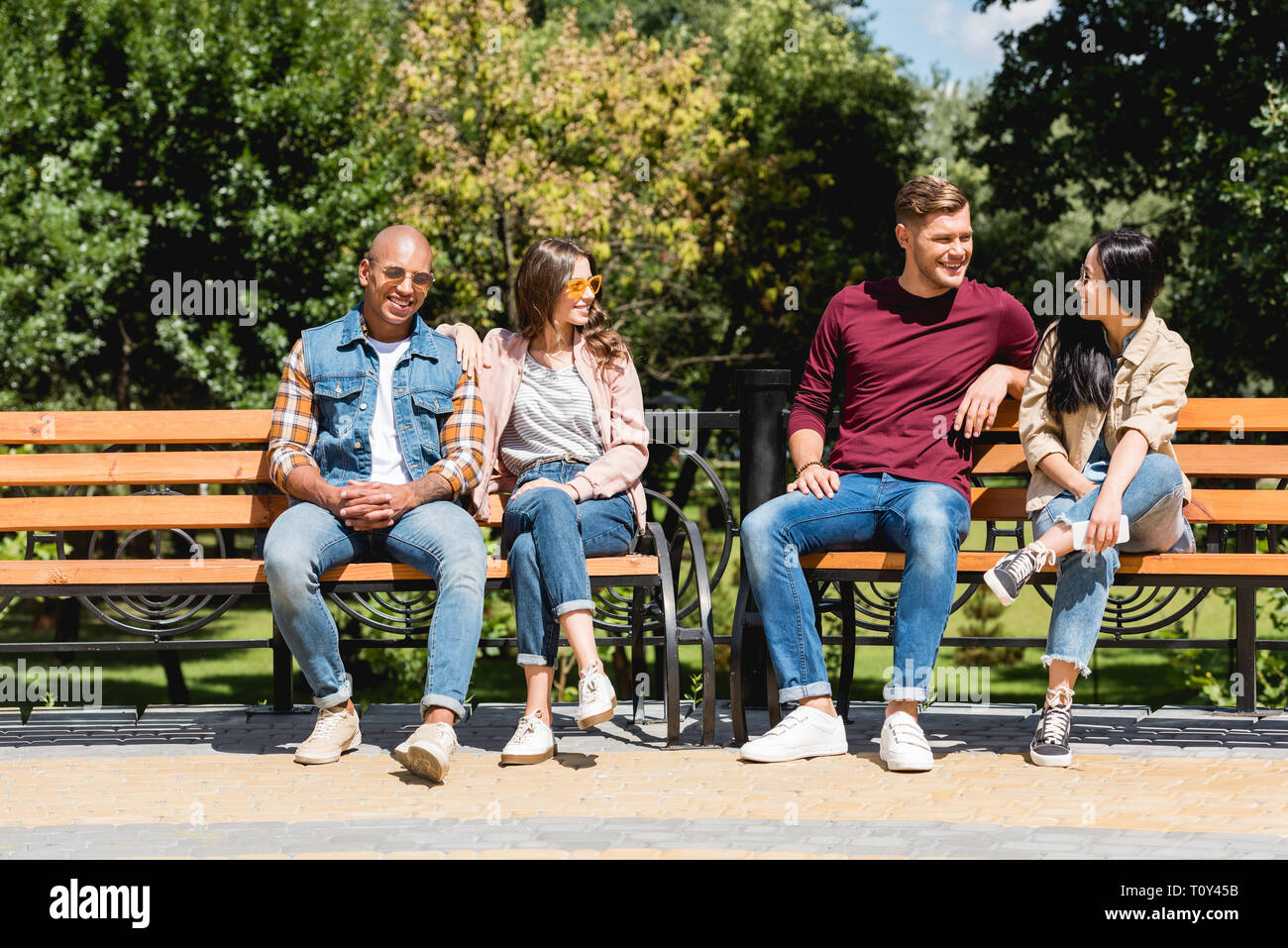 Female Male Park Benches High Resolution Stock Photography and Images ...