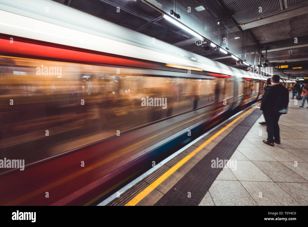 LONDON - MARCH 20, 2019: Train arriving at platform at Westminster tube ...