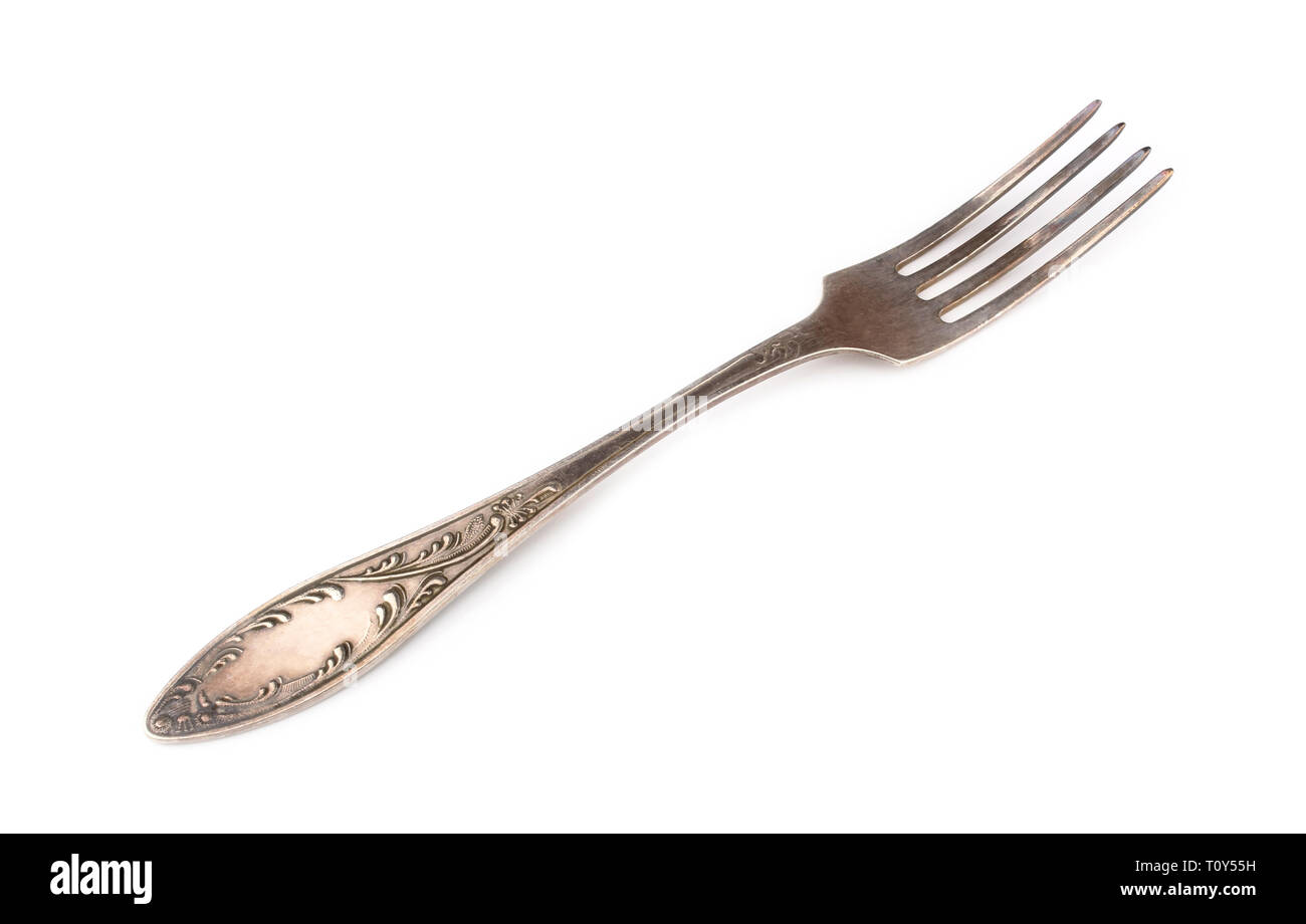 German silver fork closeup isolated on white background Stock Photo - Alamy