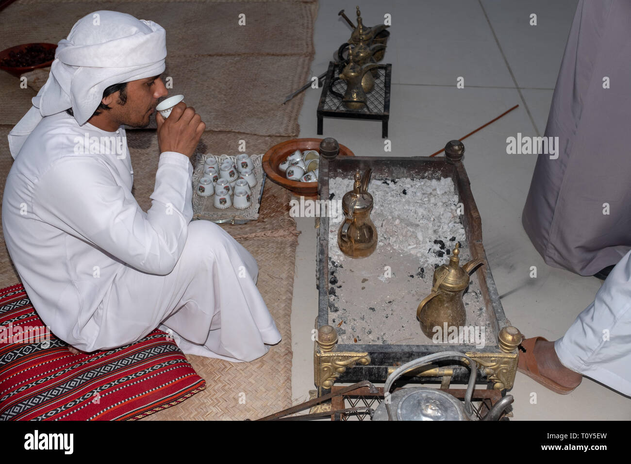 February 23, 2019 - Abu Dhabi, UAE: Young local Emirati man drinking ...