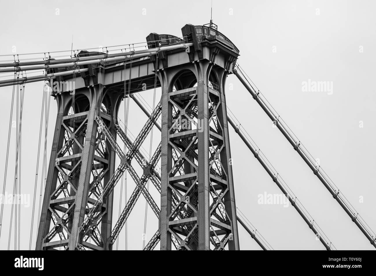 The Williamsburg Bridge, a suspension bridge in New York City, crosses the East River connecting ...