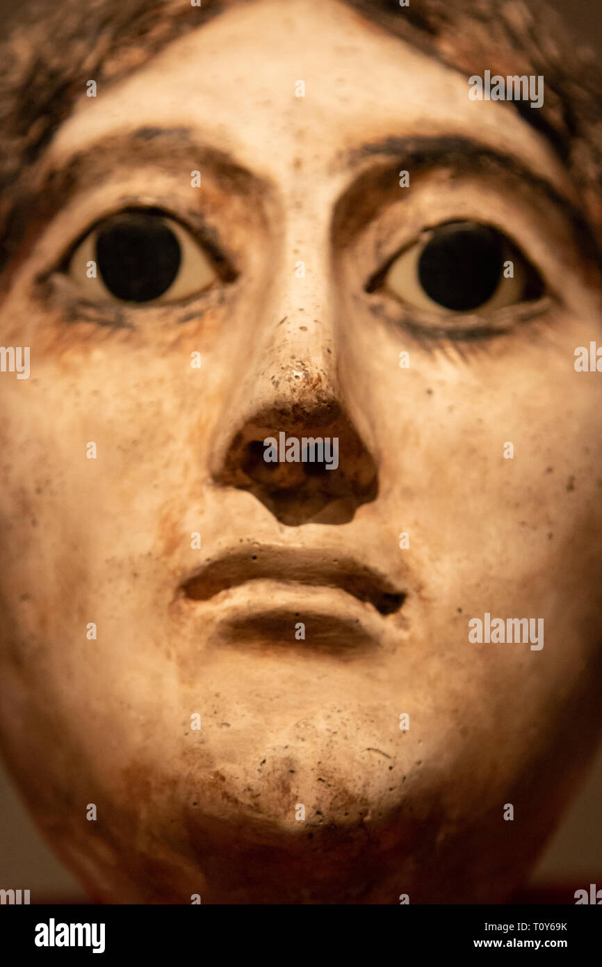 Mask of a Woman with a Large Coil of Plaited Hair, resembling portraits ...