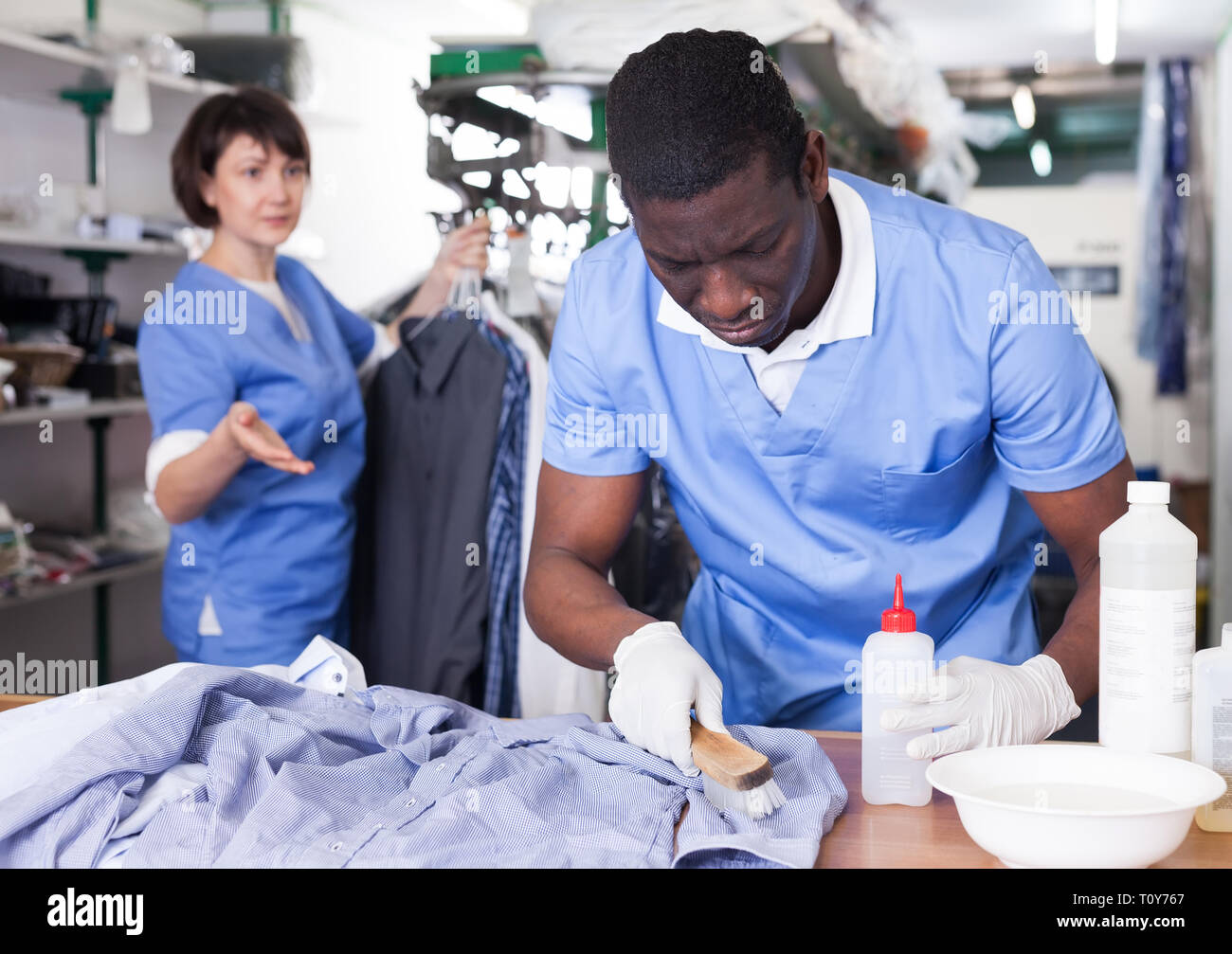 Sorting laundry african hi-res stock photography and images - Alamy