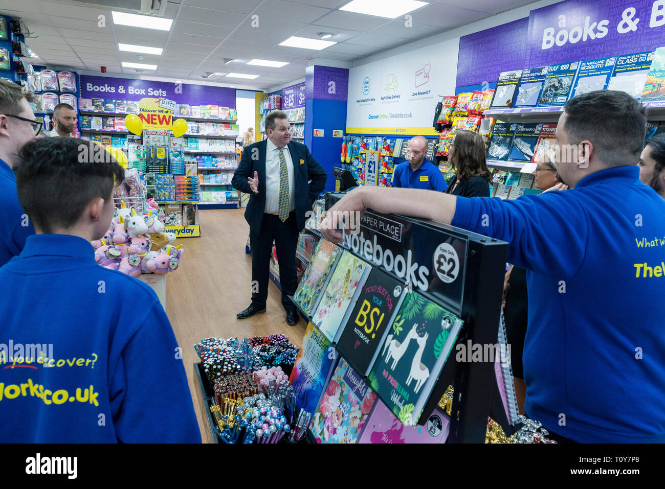 a shop manager gives a motivational team talk at the team meeting Stock ...