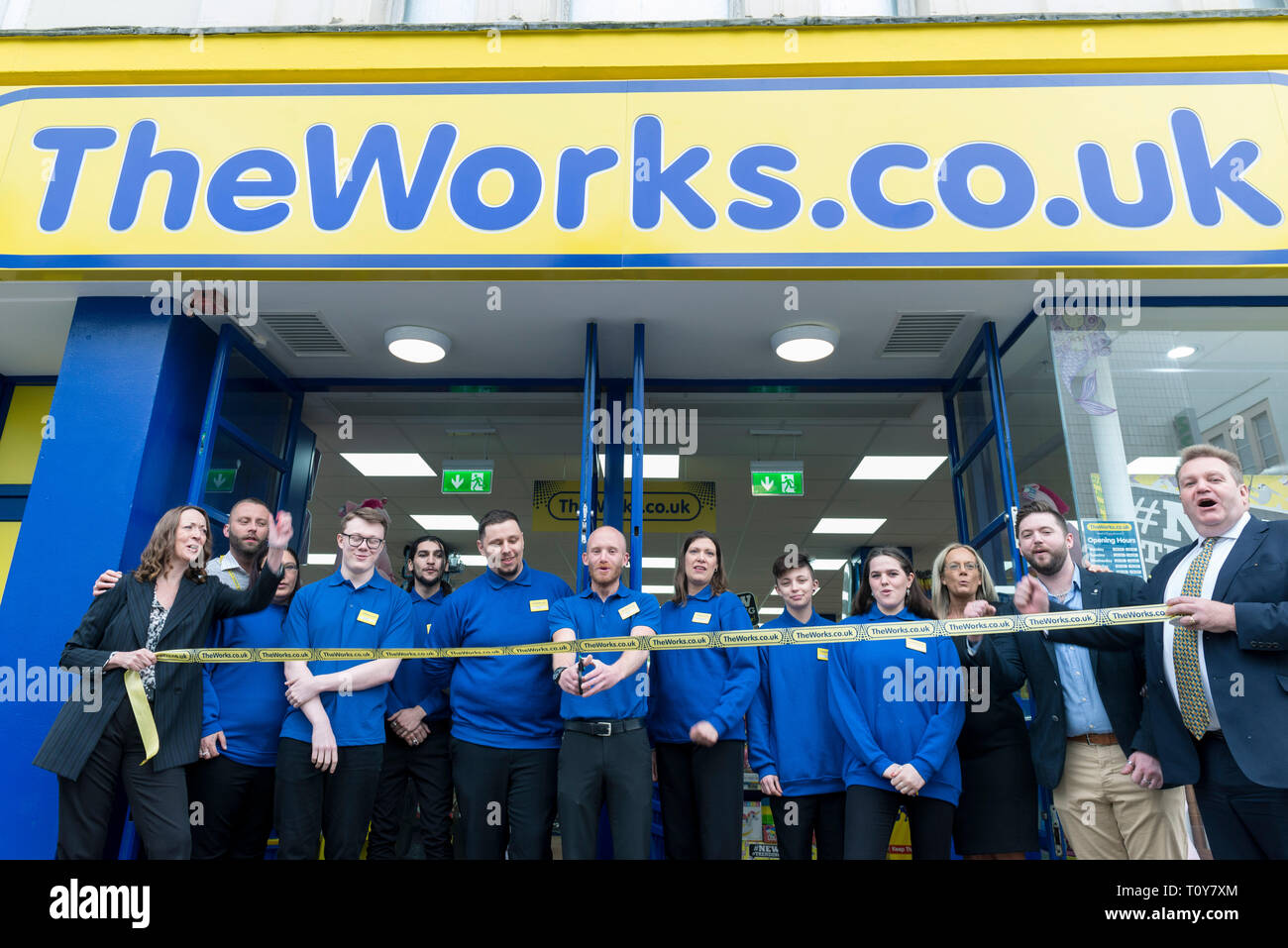 the grand opening of a shop from The Works with the ribbon cutting ...