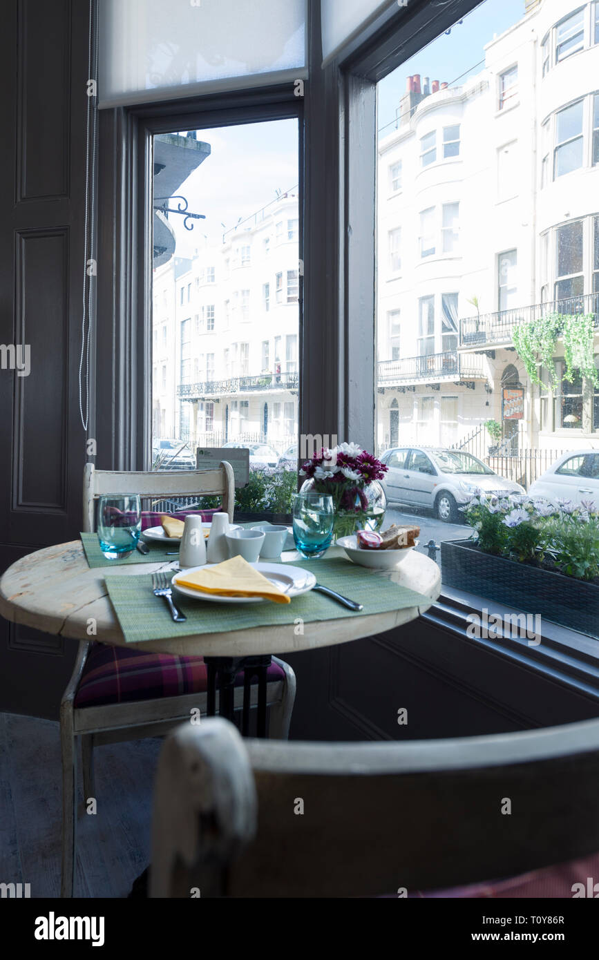 a dining table set out for breakfast in a hotel Stock Photo - Alamy