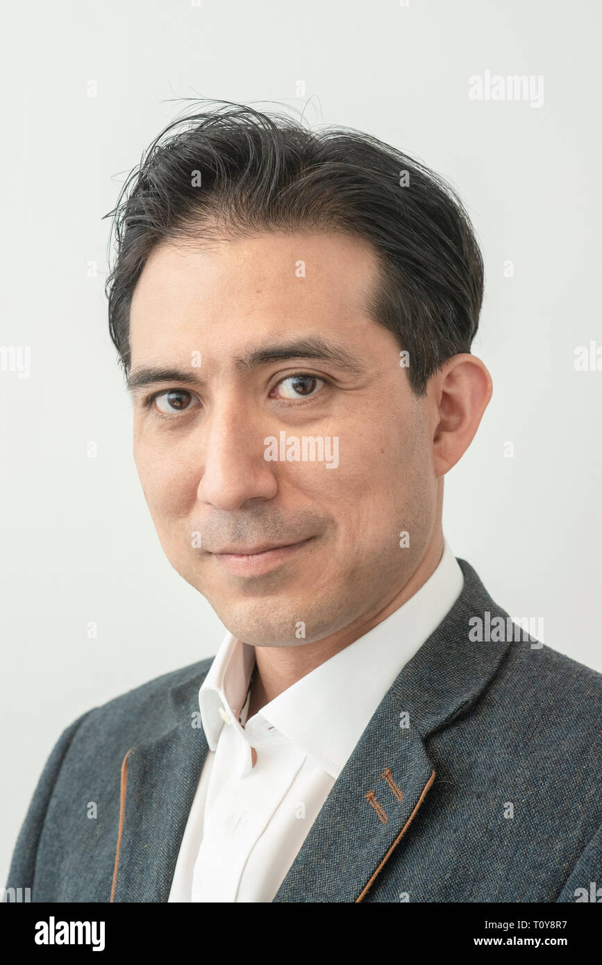 a real business man stands in front of a white background Stock Photo ...
