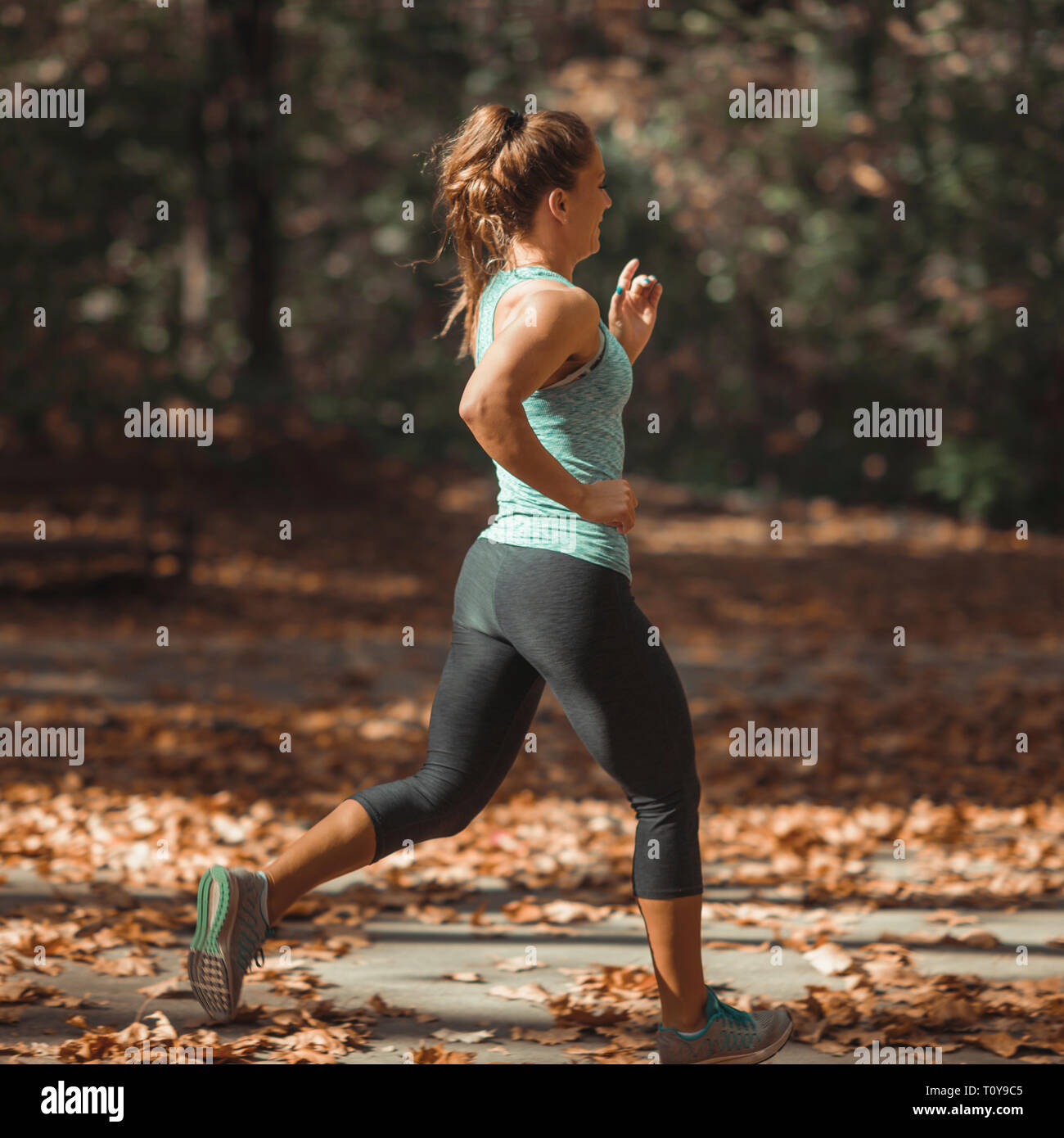 Female runner public park hi-res stock photography and images - Alamy